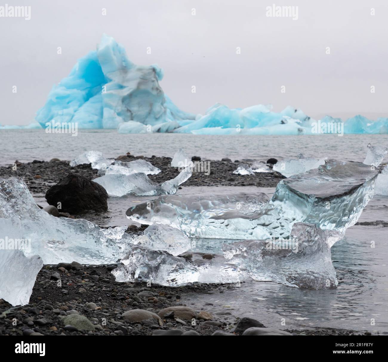 Blue Icebergs in Ocean Water. Glacier Ice Drift at Calm Water. Pure Ice ...
