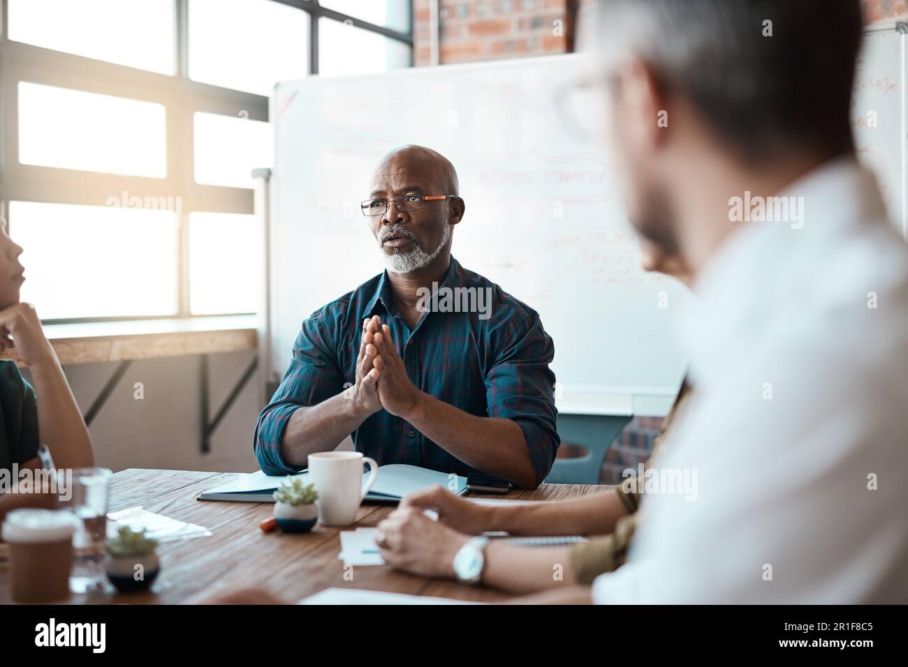 Serious ceo speaking corporate hi-res stock photography and images - Alamy