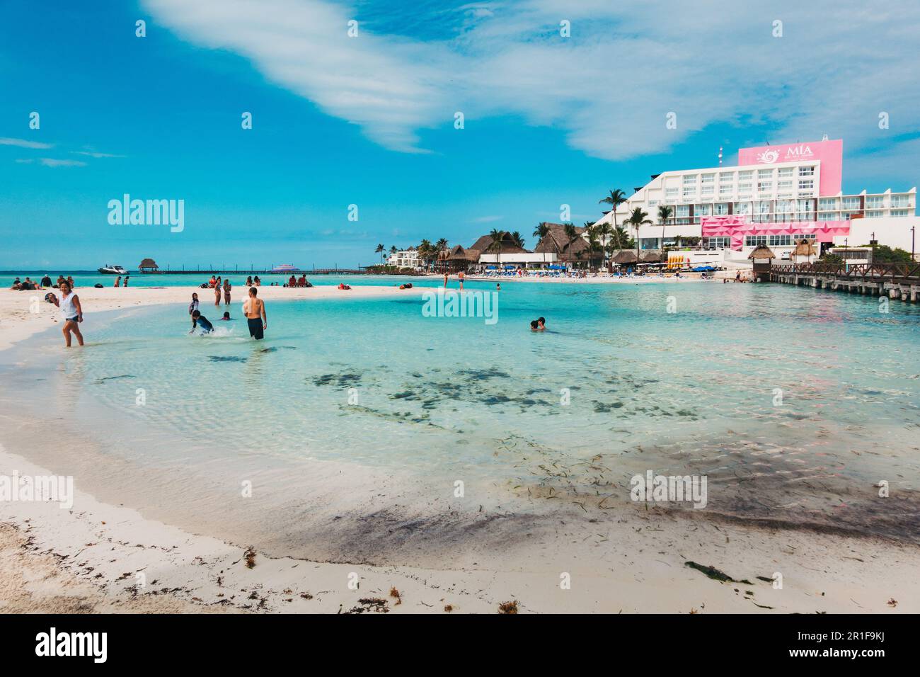 holidaymakers relax by a lagoon next to the MÍA Reef resort on the ...