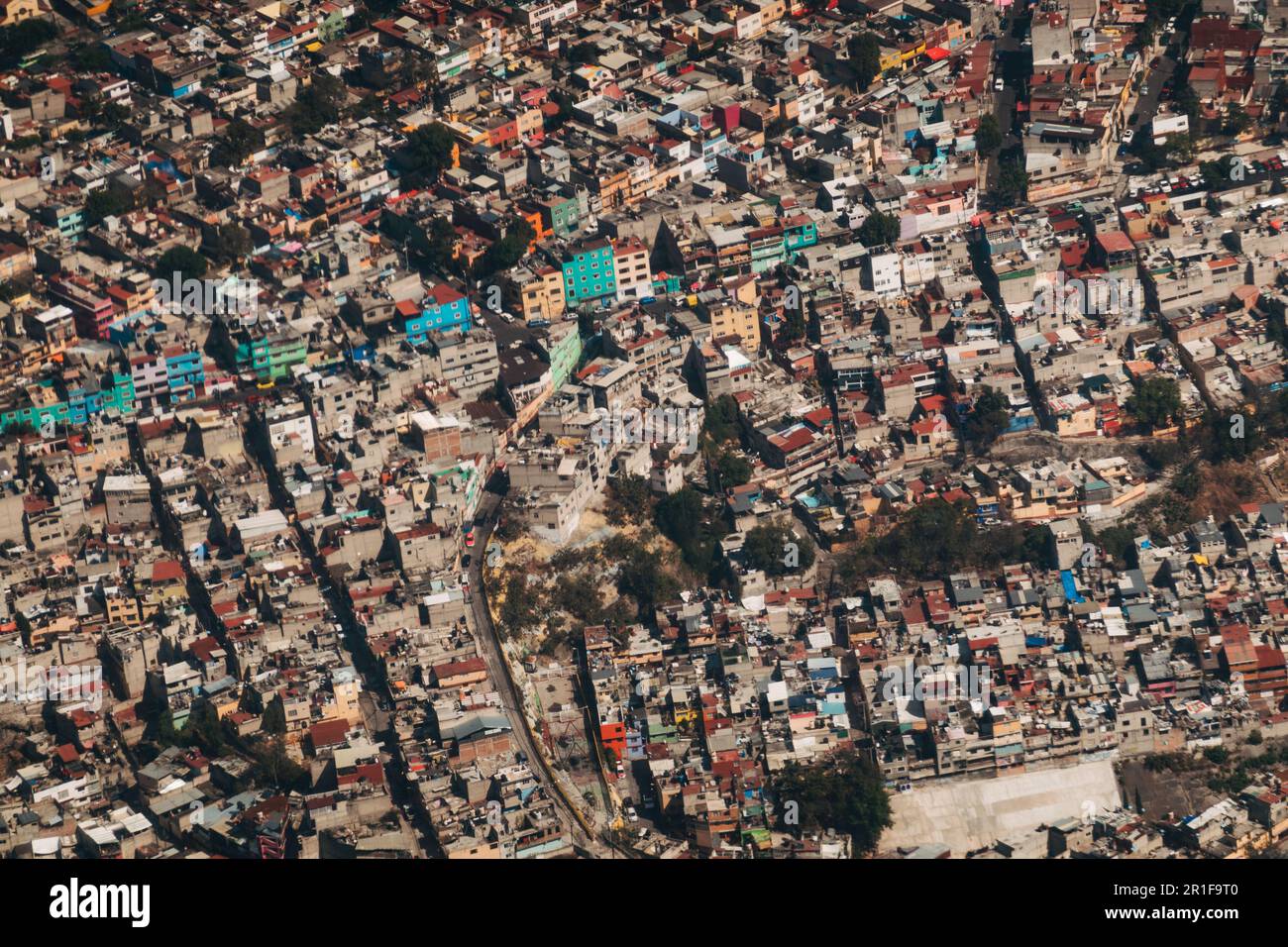 An aerial view of the colorful walls and roofs of houses in the outer ...