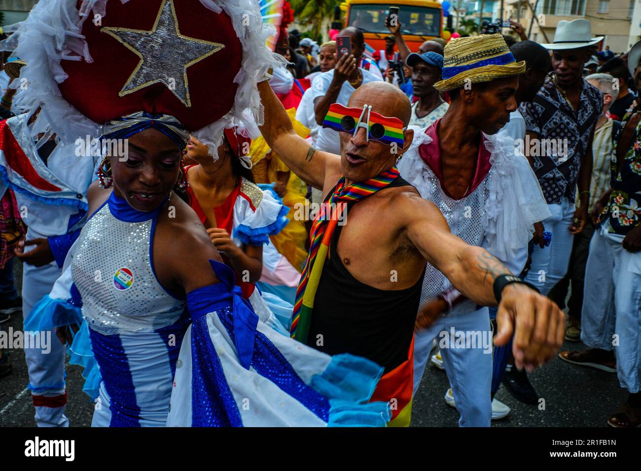 Members of Cuba's LGBTQ community dance during the annual gay pride ...