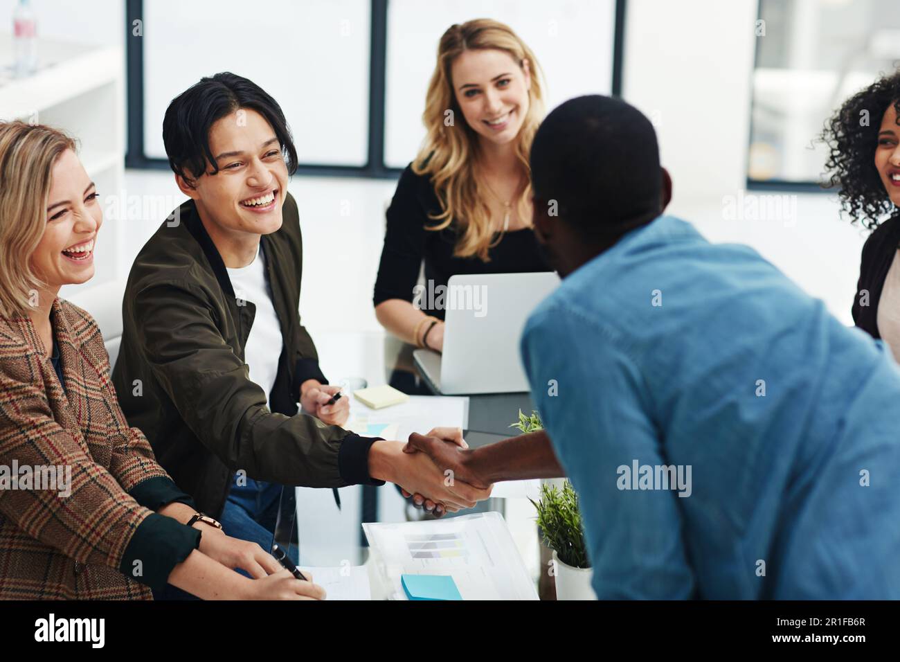 Teamwork, handshake and business people in meeting for collaboration ...