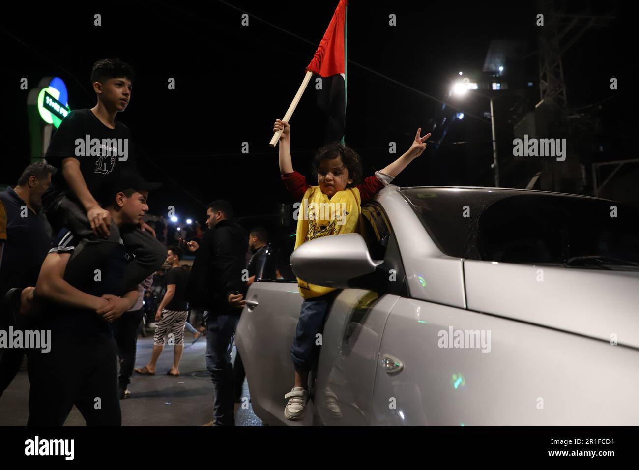 Gaza. 13th May, 2023. Palestinians celebrate the announcement of the ...