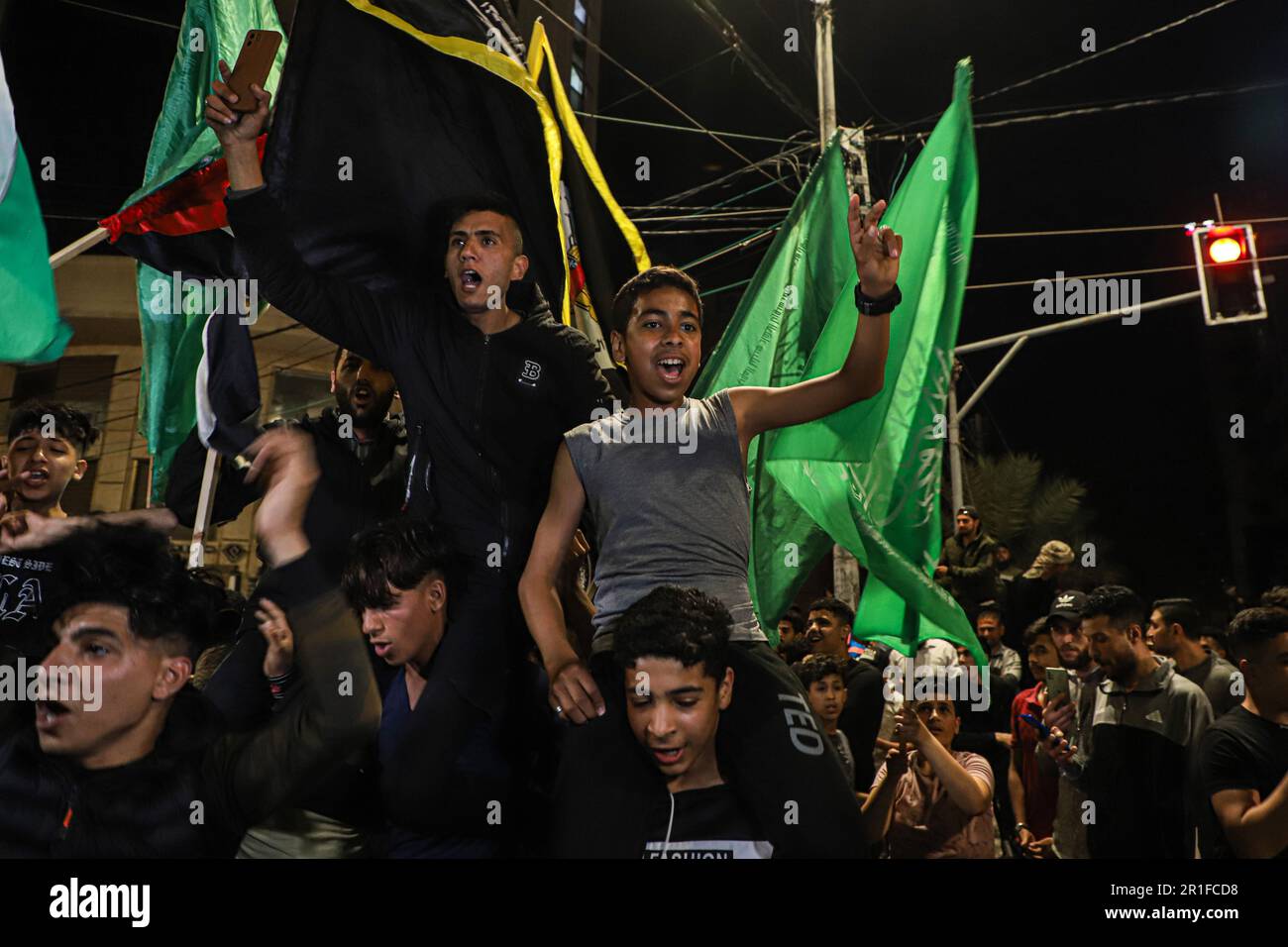 Gaza. 13th May, 2023. Palestinians celebrate the announcement of the ...