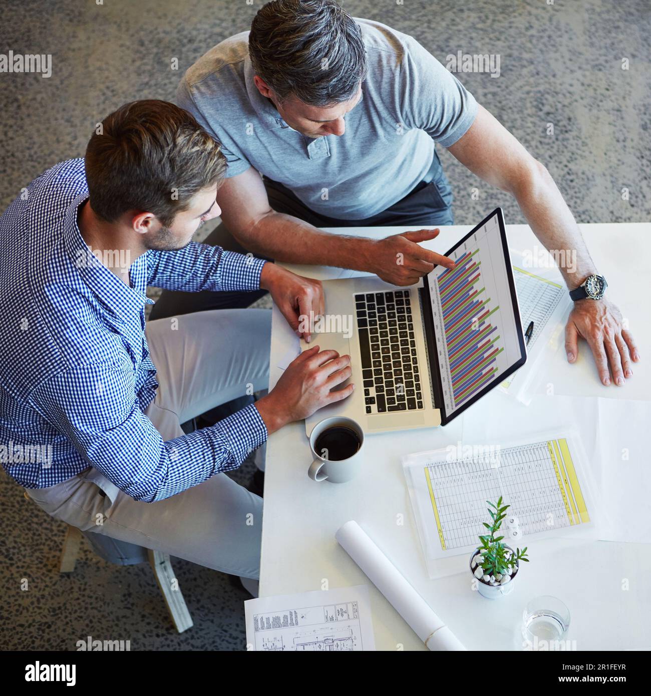 Laptop data, discussion and business people teamwork on stats analysis ...