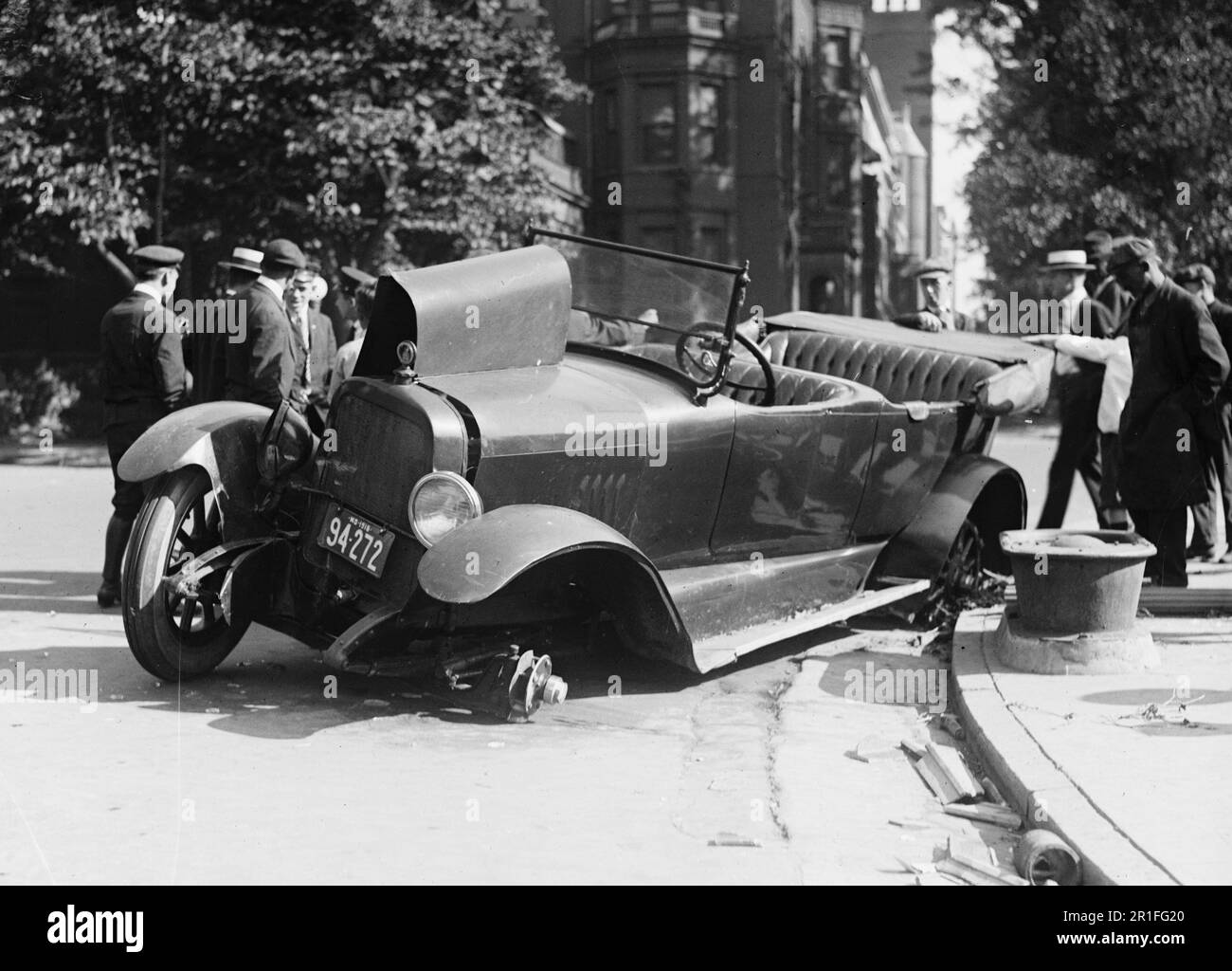 Archival Photo: Passersby look at an auto accident ca. 1918-1920 Stock ...