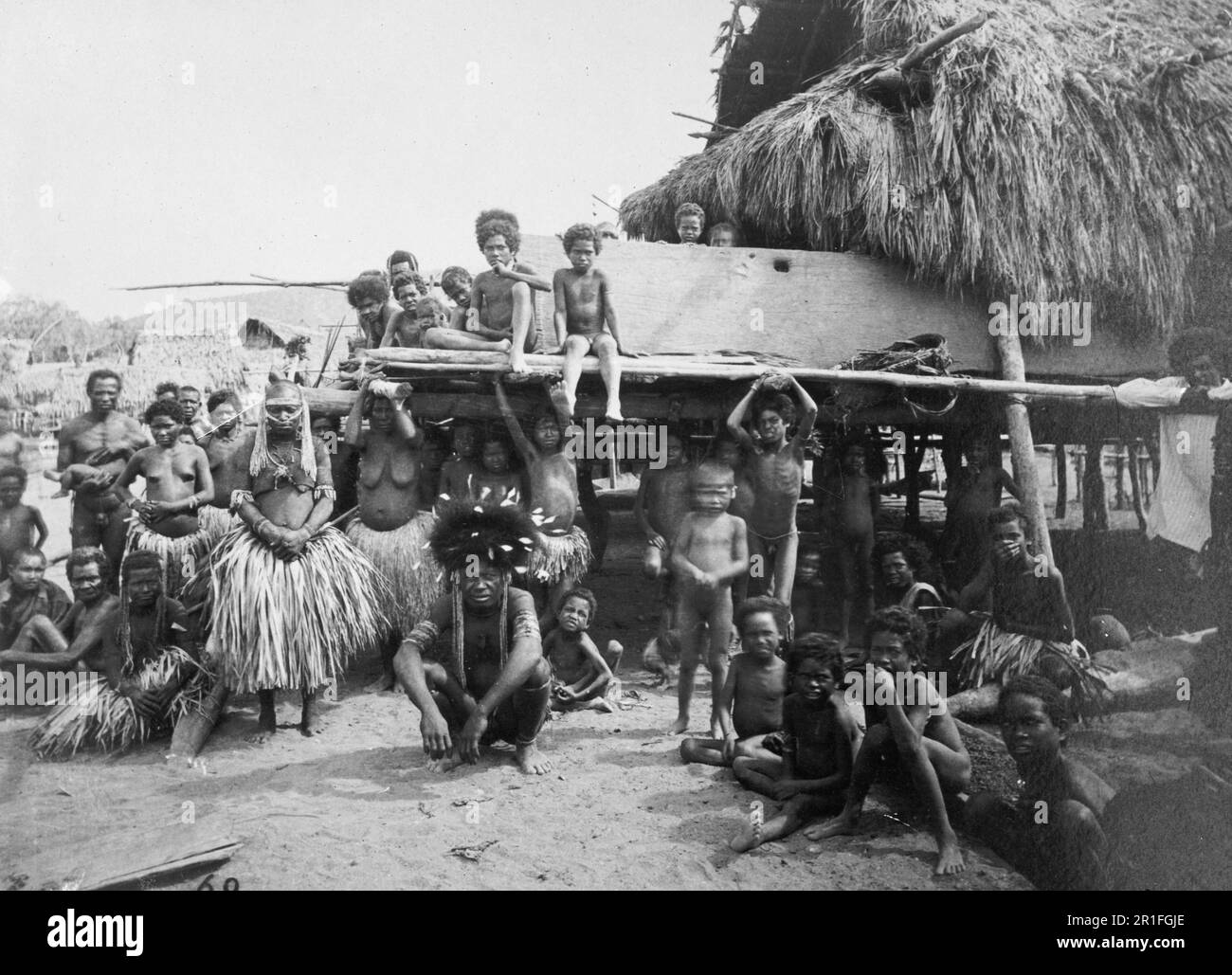 Archival Photo: Natives on a South Sea Island pose for a photo ca. 1918-1920 Stock Photo - Alamy