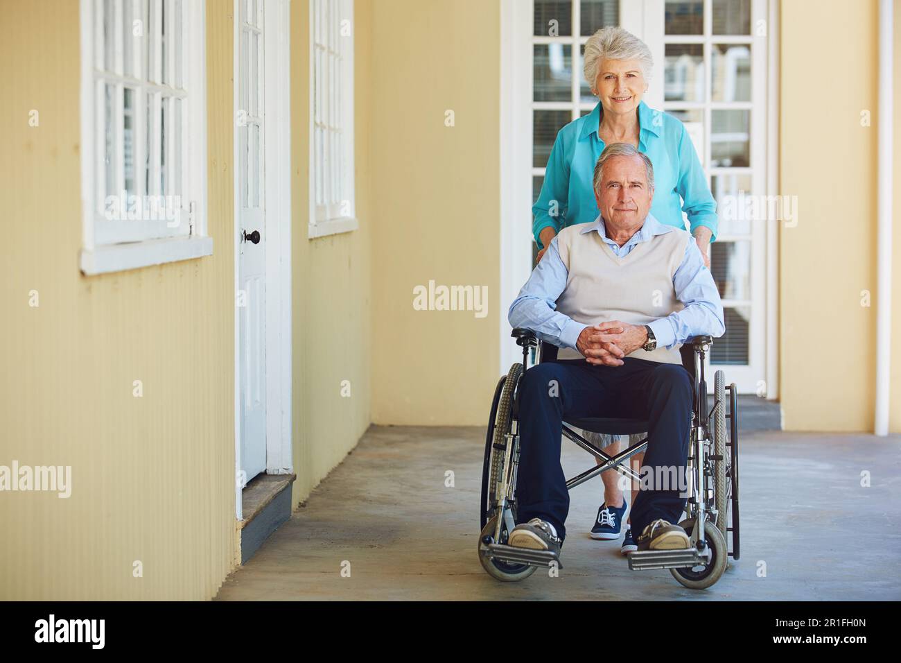 Helping elderly disabled wife hi-res stock photography and images - Alamy