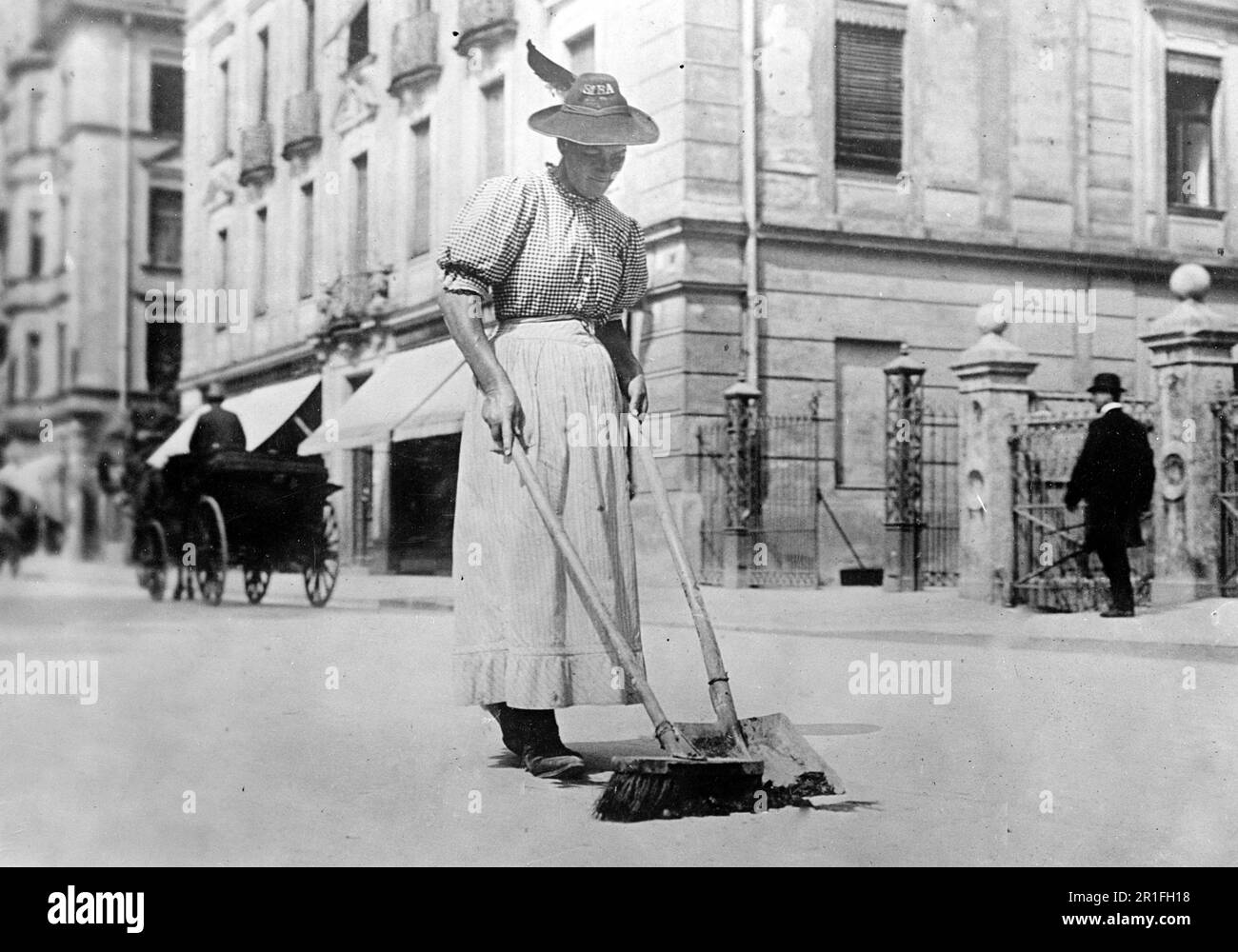 Archival woman street sweeper Black and White Stock Photos & Images - Alamy
