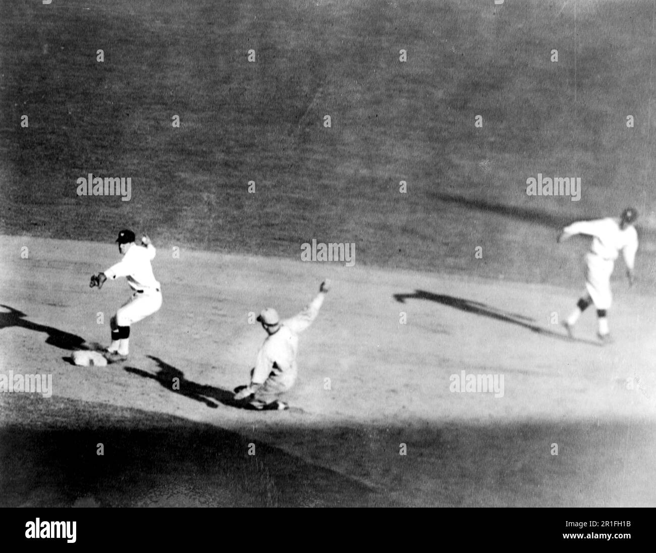 Archival Photo: Washington fielder tags second base ahead of sliding ...