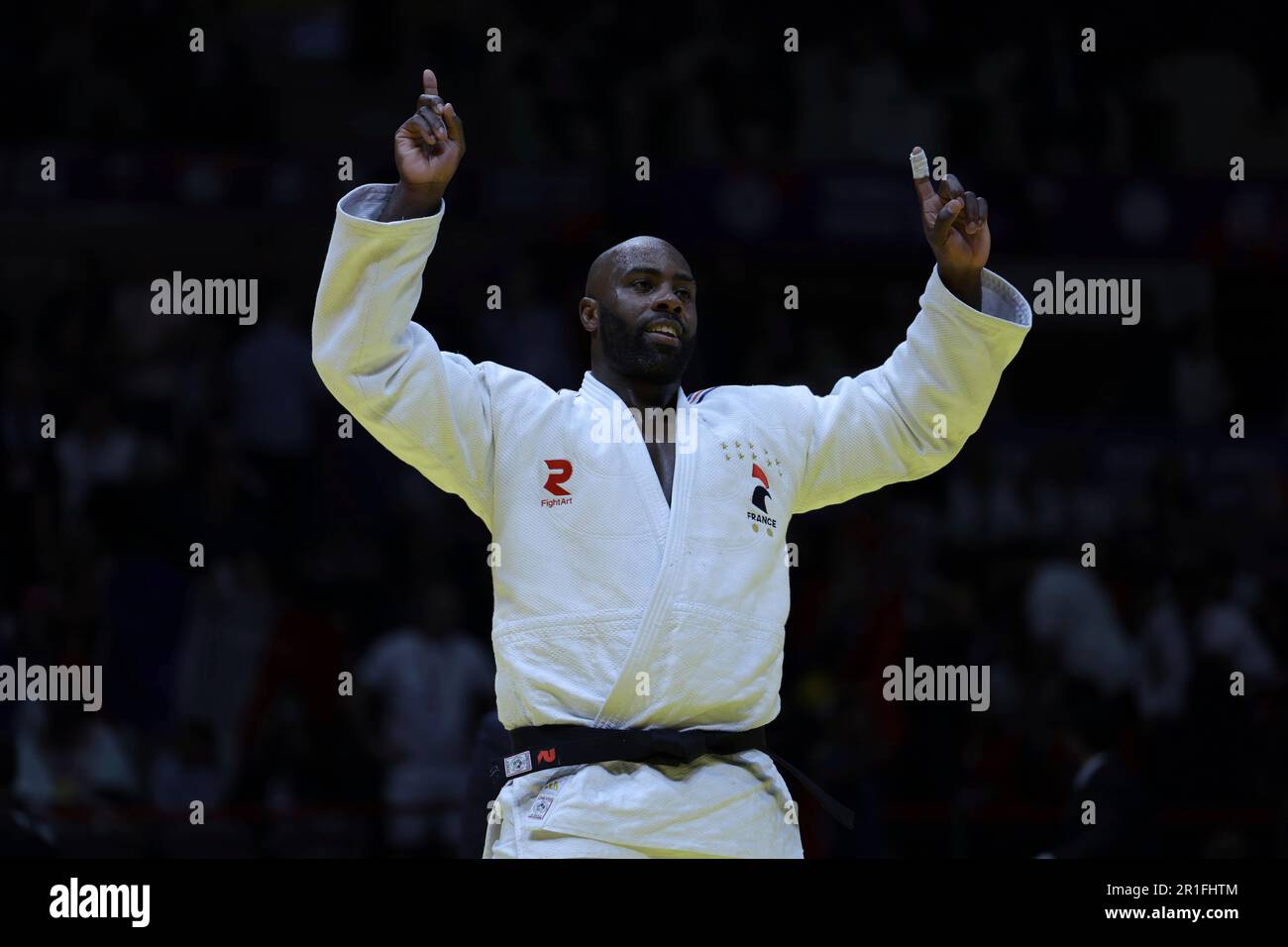 France's Teddy Riner celebrates after winnning the men's +100kg class ...