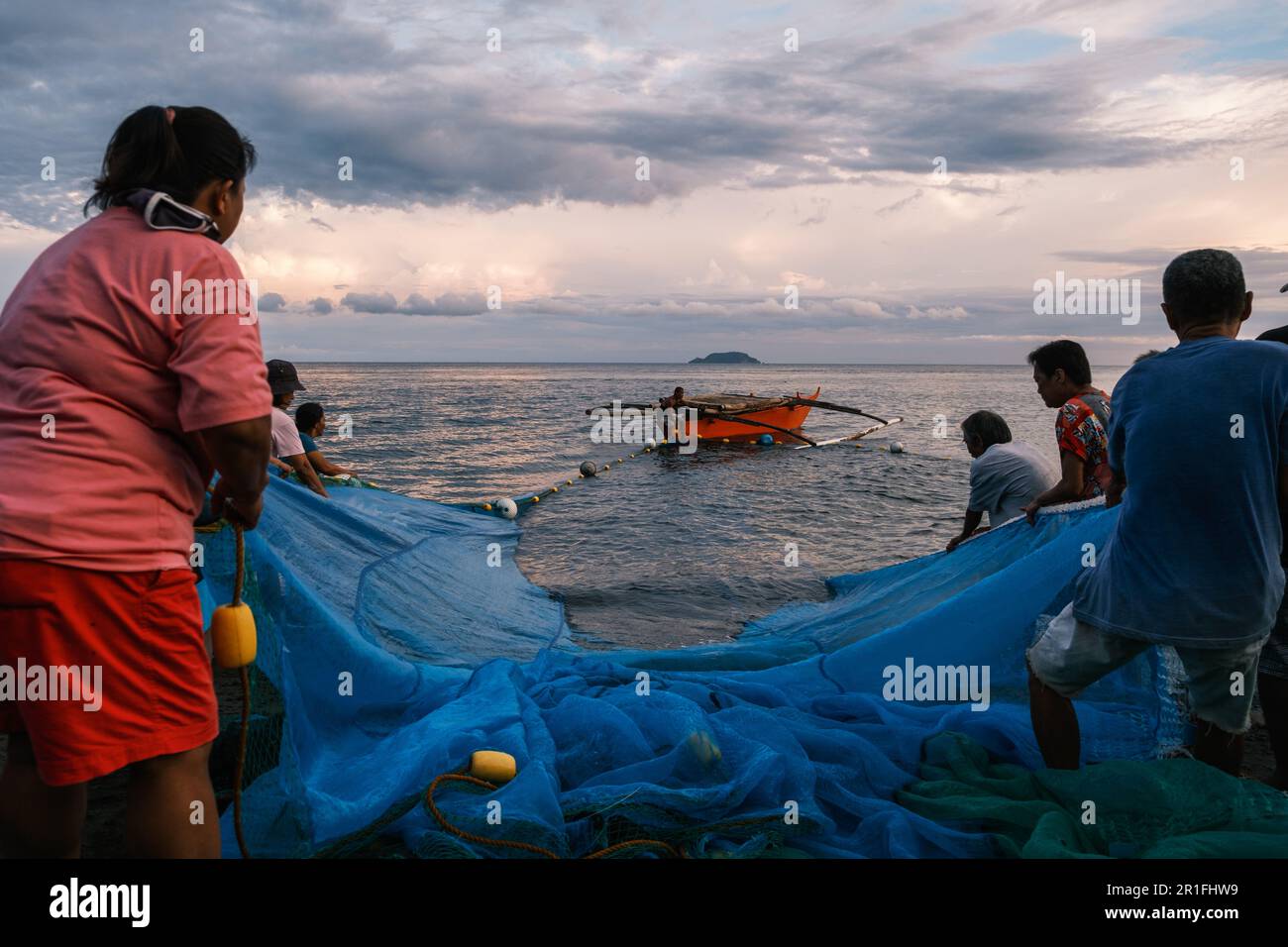 Fishing boats pulling nets hi-res stock photography and images - Alamy