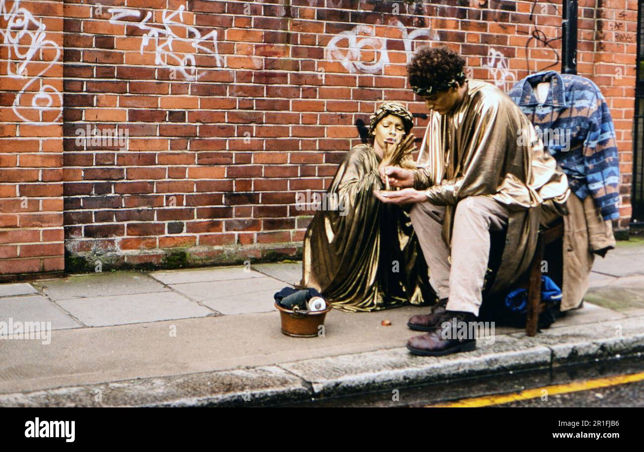 Street performer in London taking a break from his busy schedule of ...