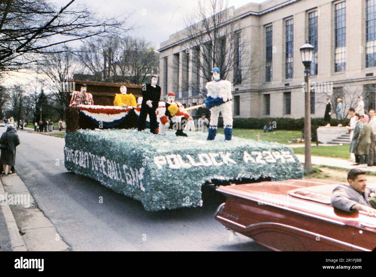 A "Take Me Out to the Ball Game" baseball themed float in a parade ca ...