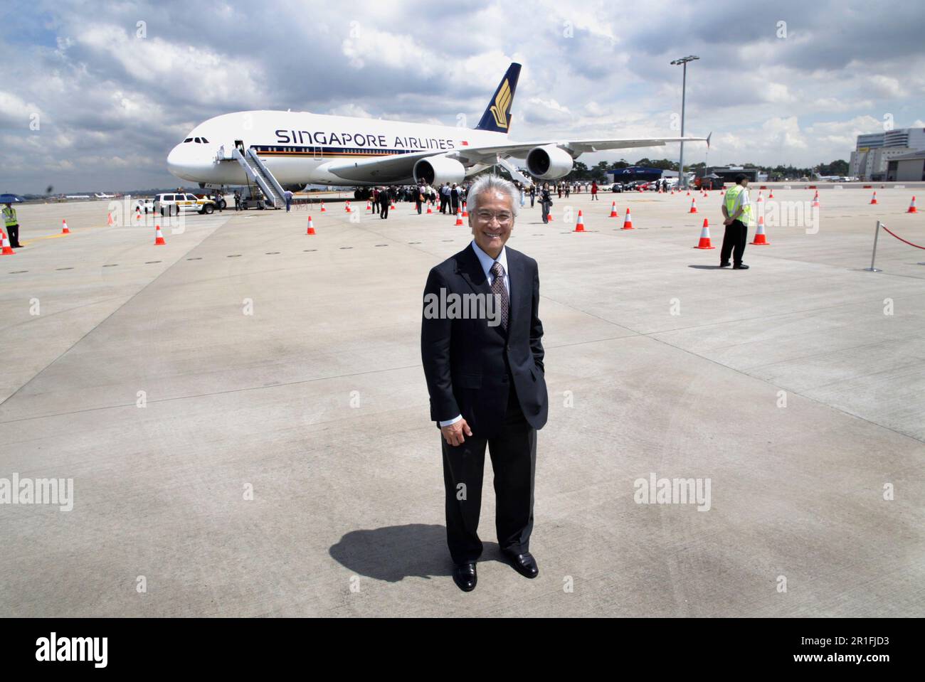 Mr Chew Choon Seng, CEO of Singapore Airlines, poses in front of the ...