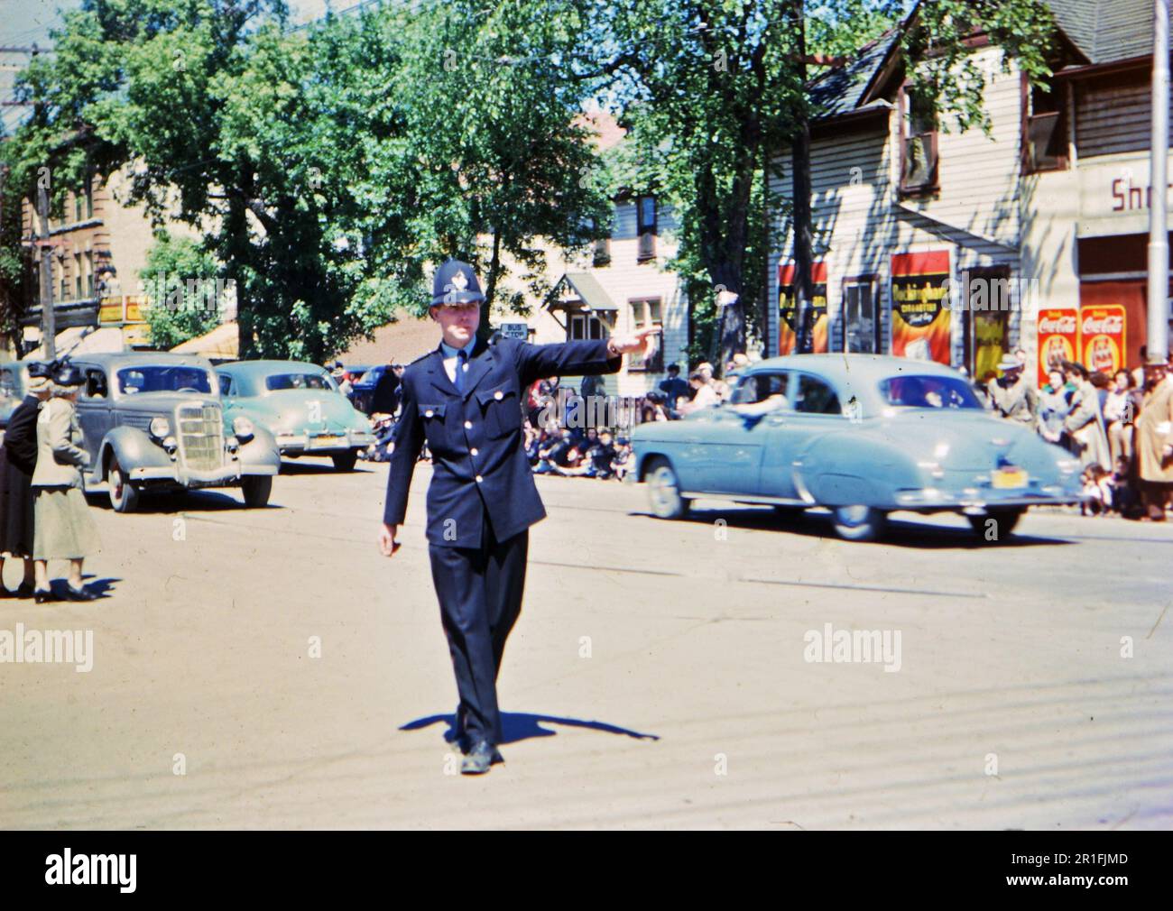 Police officer directing traffic in an unidentified town in Canada ca ...