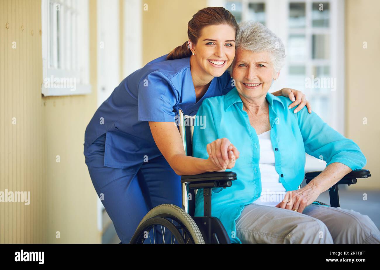 Portrait of nurse, hugging or old woman in wheelchair in hospital ...