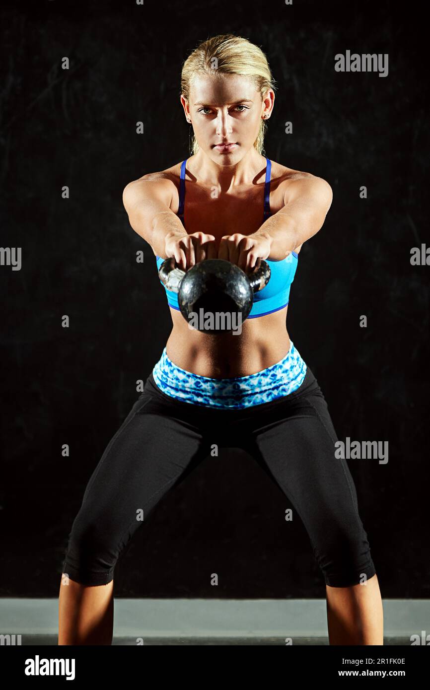 Woman in portrait, kettlebell and weightlifting with fitness ...