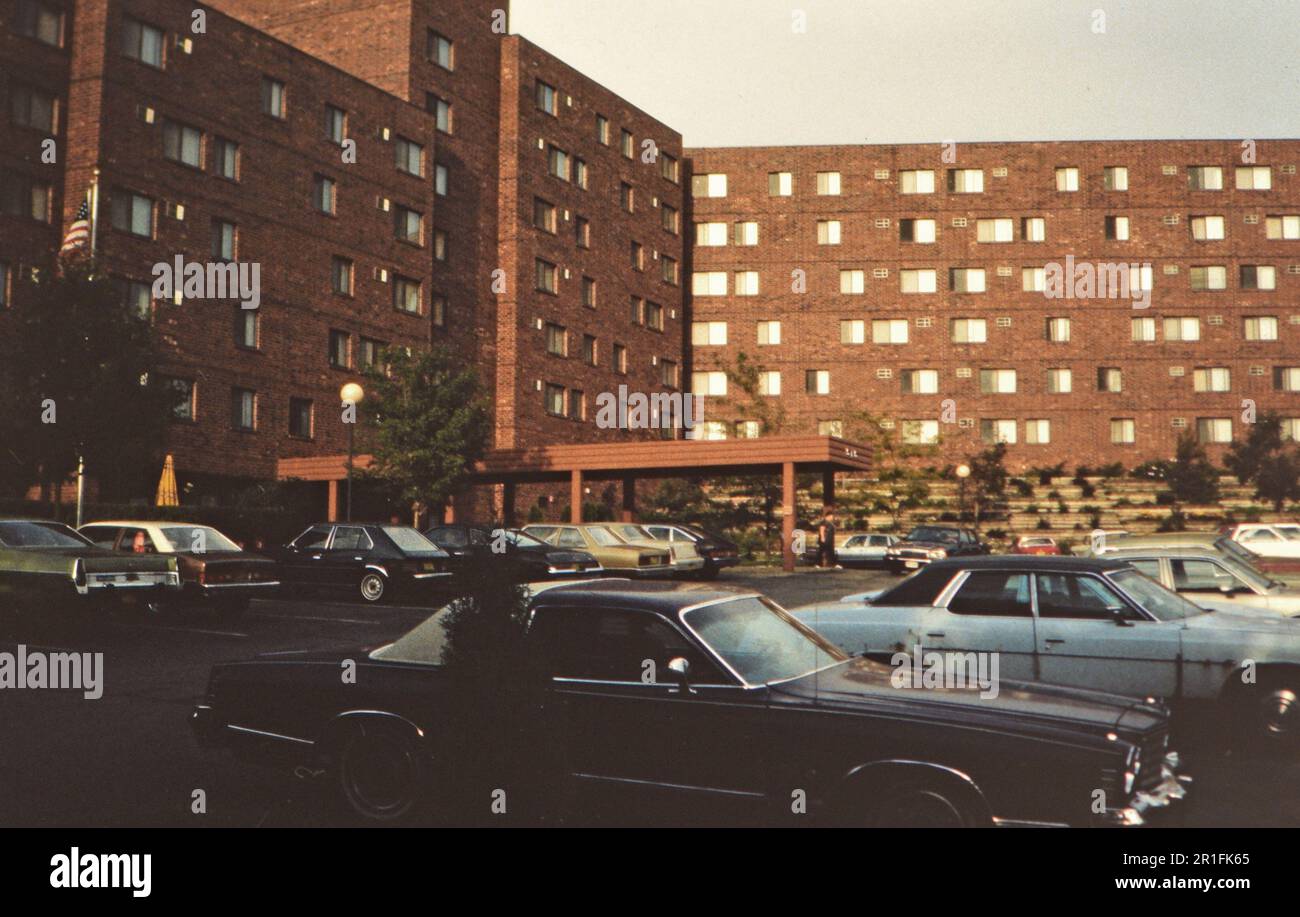 Cars in a parking lot of an apartment building in an unidentified ...