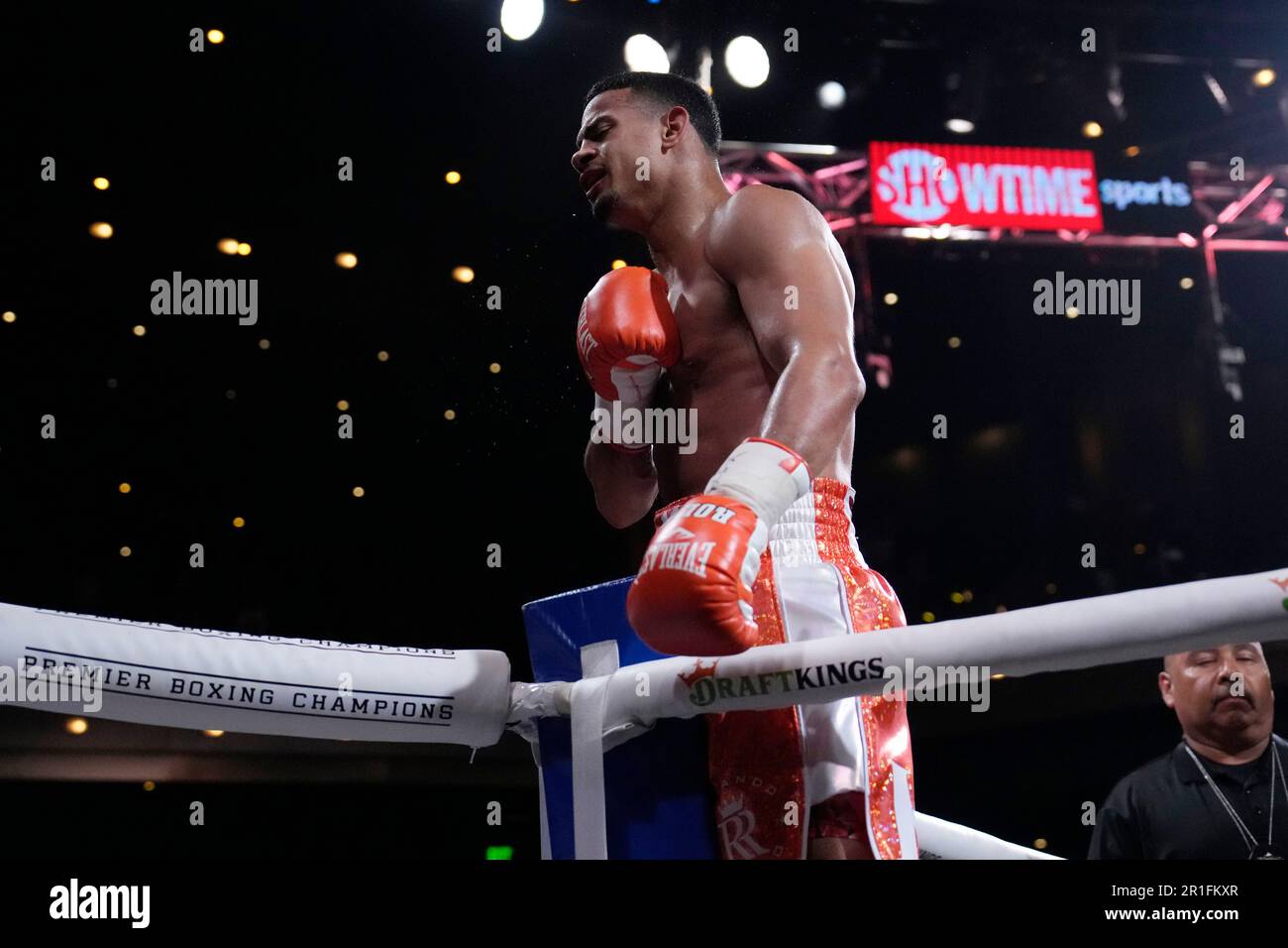 Rolando Romero celebrates after defeating Ismael Barroso in a super ...