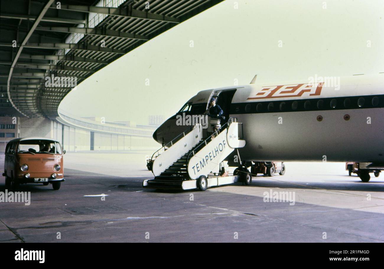 Flight attendant exiting a British European Airways plane (BEA Airplane ...
