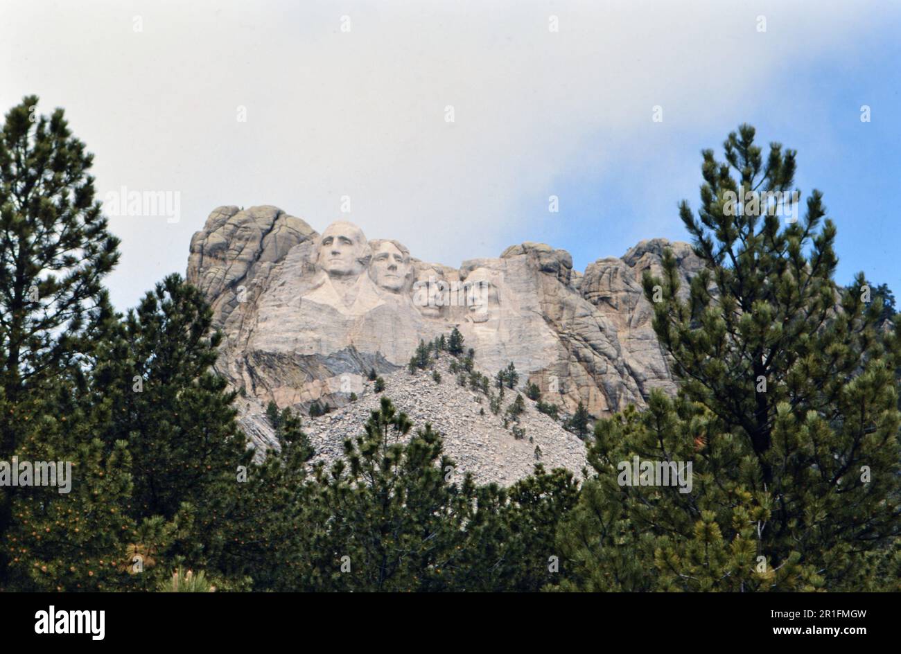 Mount Rushmore framed by trees ca. 1987 Stock Photo - Alamy