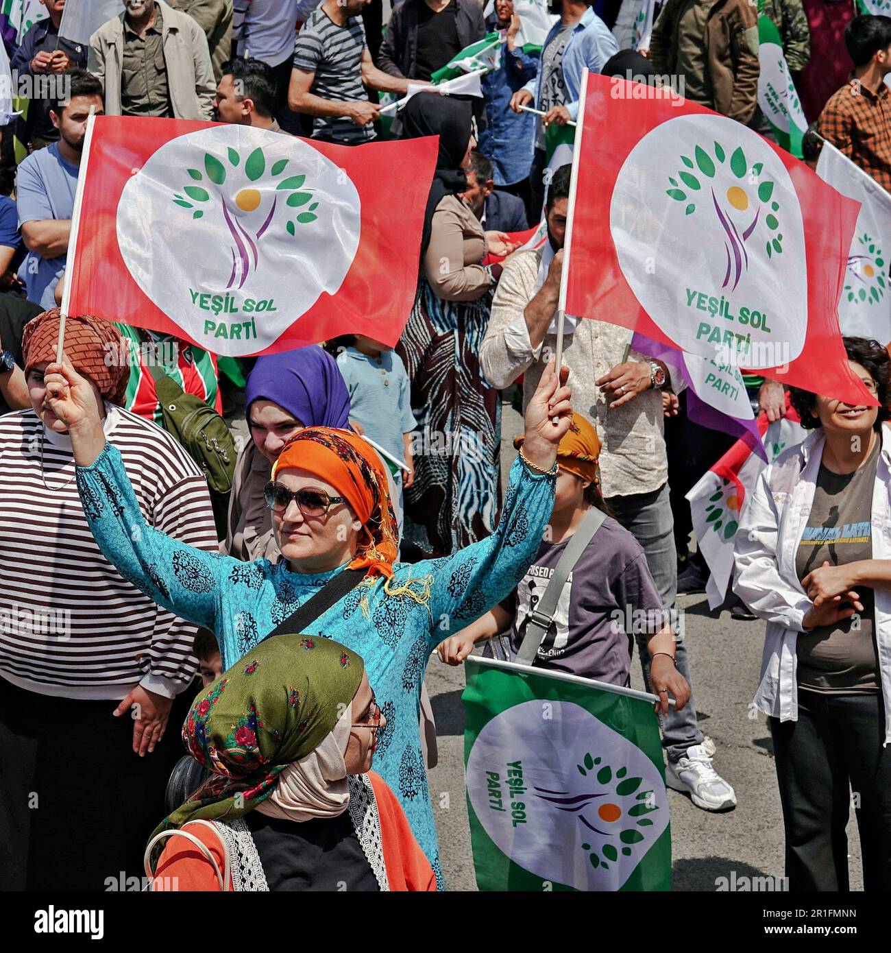 Diyarbakir, Turkey. 13th May, 2023. A female supporter waves flags ...