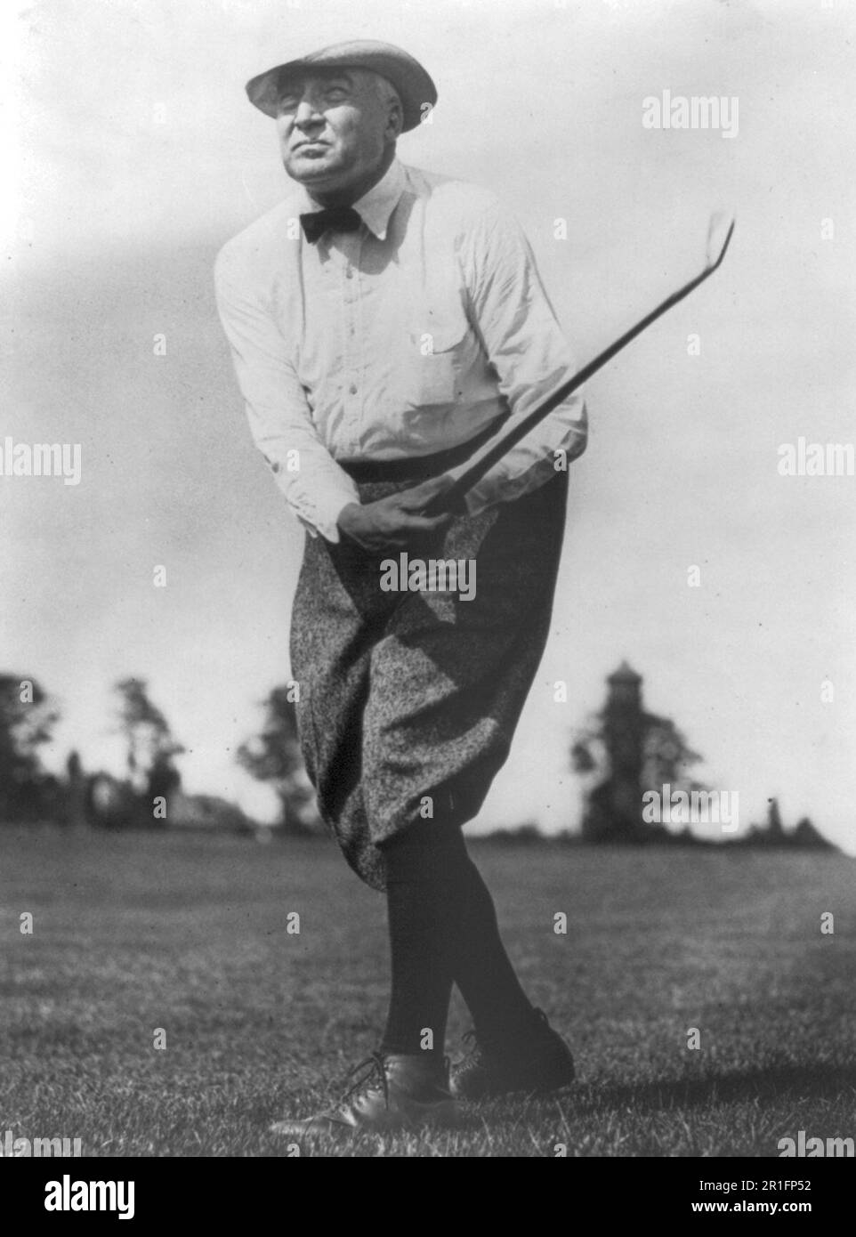 Archival Photo: Warren G. Harding, full length, facing left, swinging ...