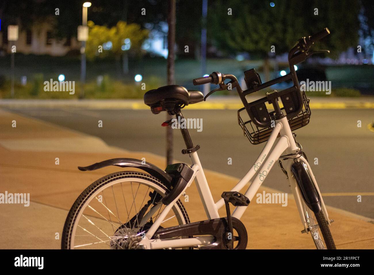 Bicycles at night Stock Photo - Alamy