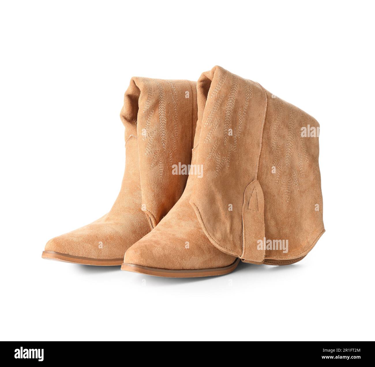 Suede cowboy boots isolated on white background Stock Photo - Alamy