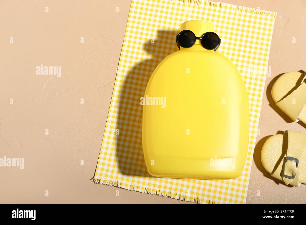 Creative composition with sunscreen cream and beach accessories on ...