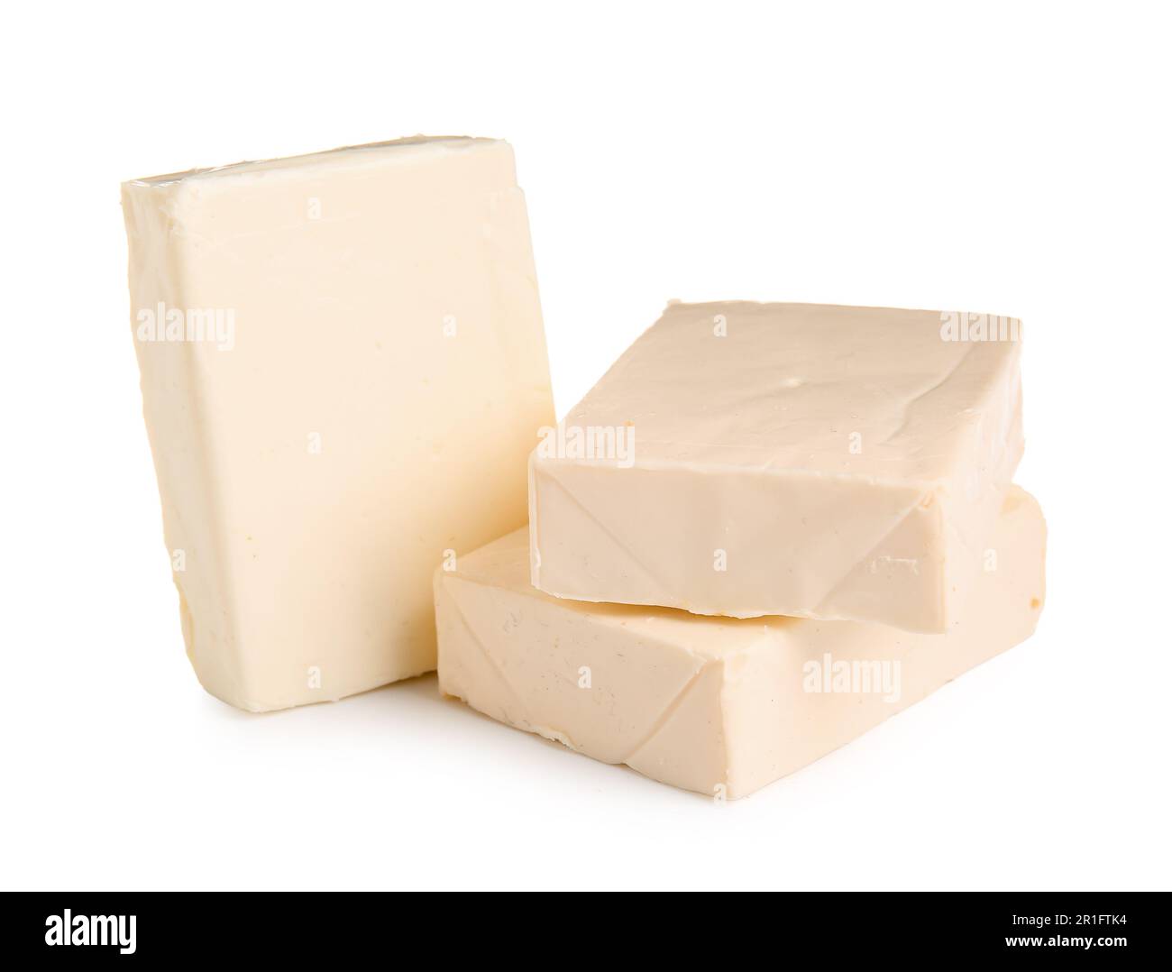 Processed cheese isolated on white background Stock Photo - Alamy