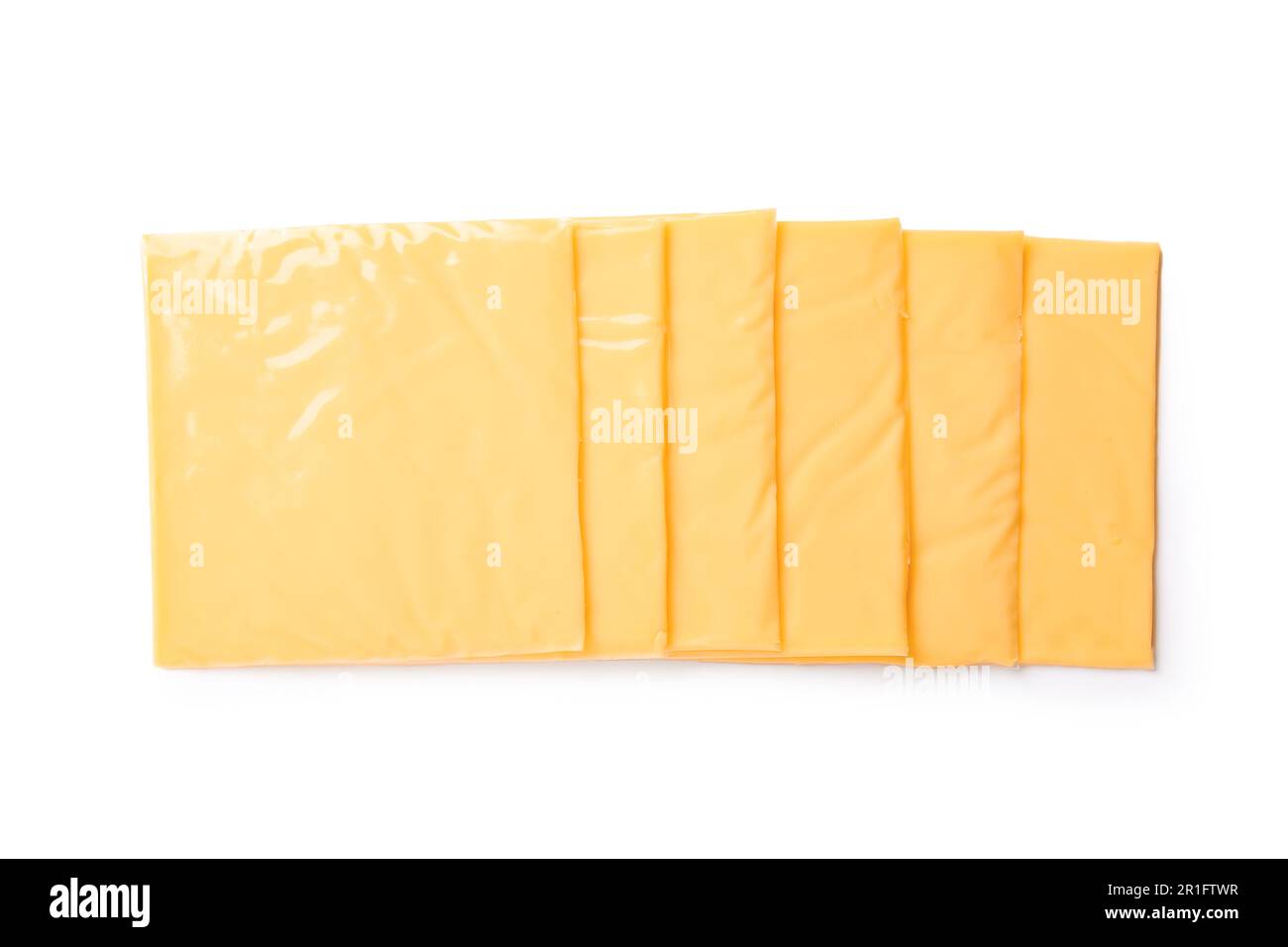 Slices of tasty processed cheese on white background Stock Photo - Alamy