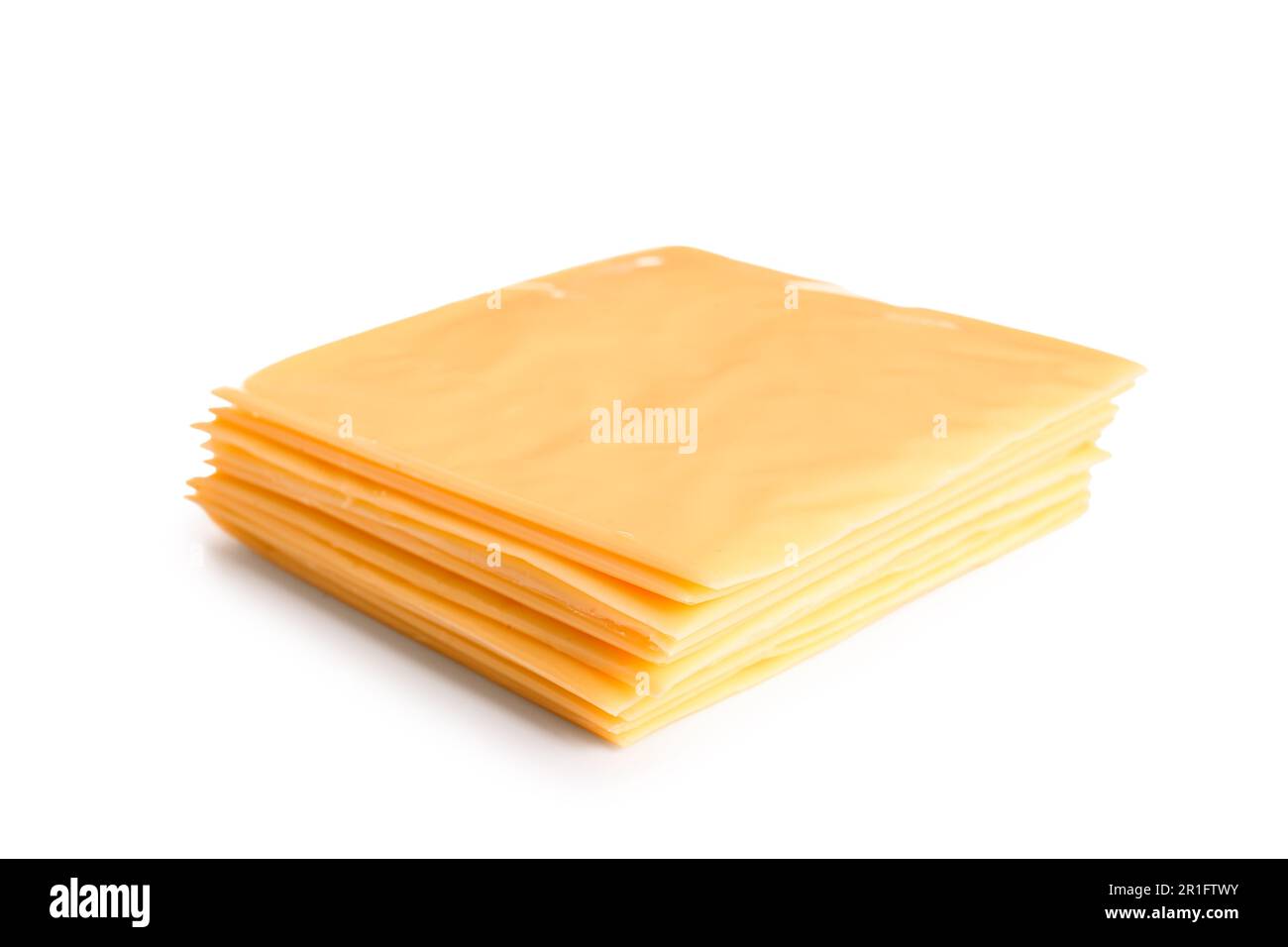 Slices of tasty processed cheese on white background Stock Photo - Alamy
