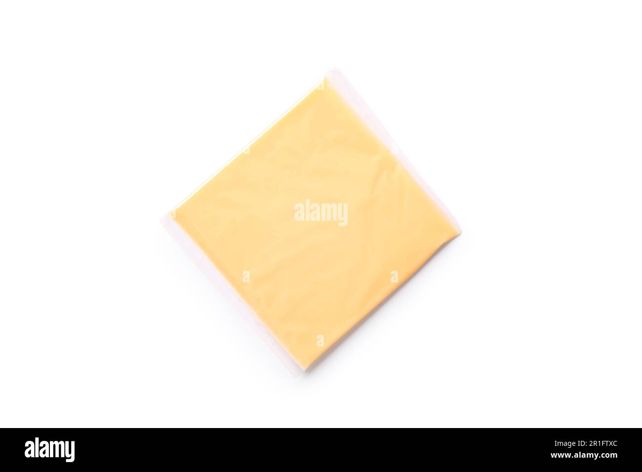 Slice of tasty processed cheese on white background Stock Photo - Alamy