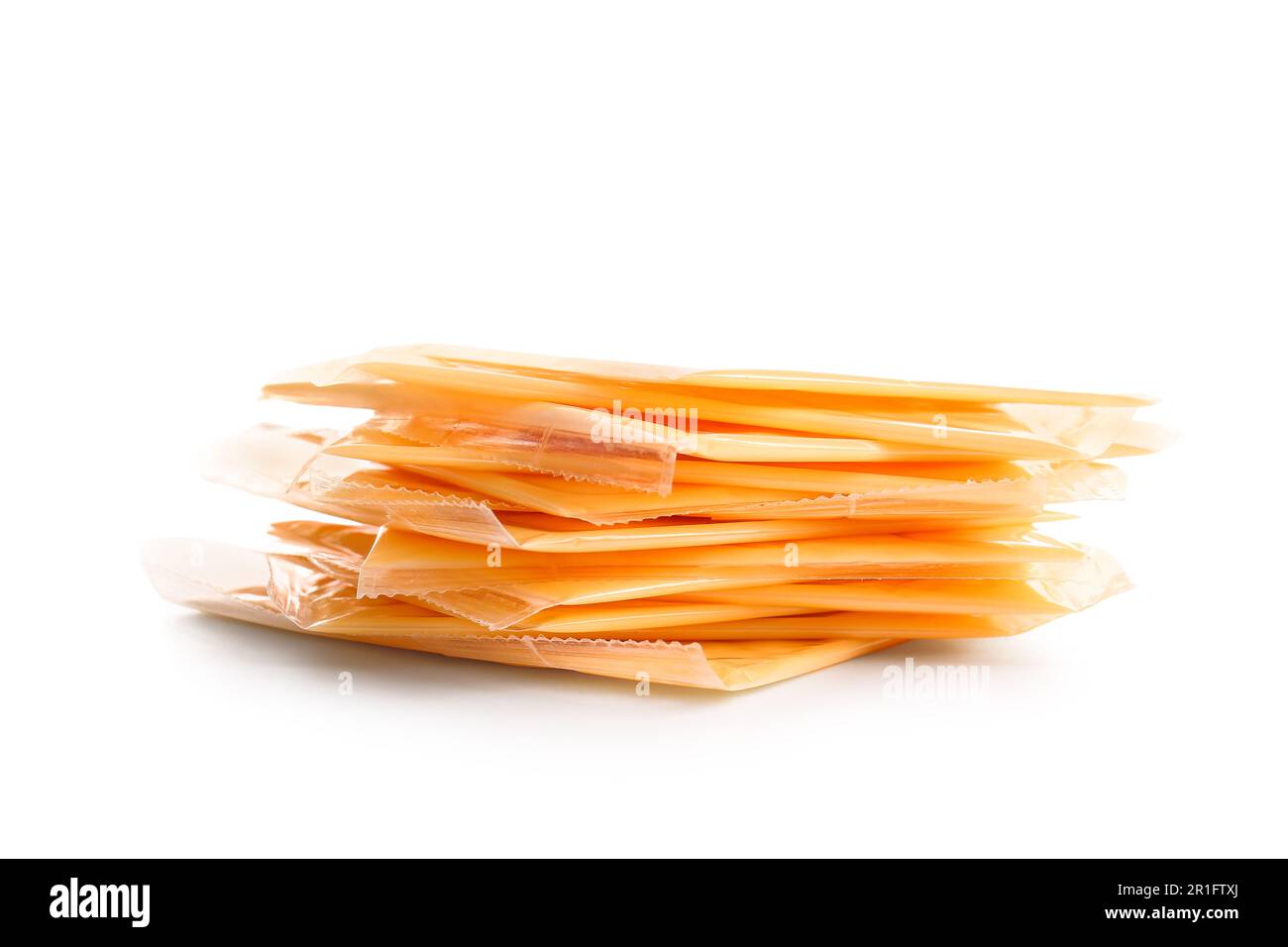 Slices of tasty processed cheese on white background Stock Photo - Alamy