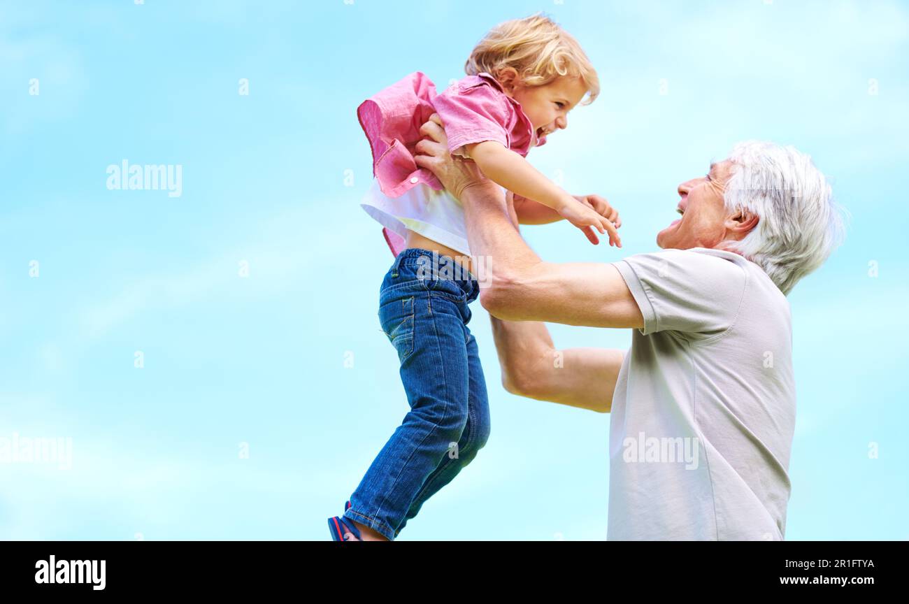 Happy, lifting and fun with grandfather and grandson for bonding ...