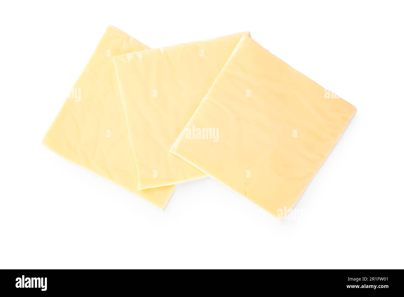 Slices of tasty processed cheese on white background Stock Photo - Alamy