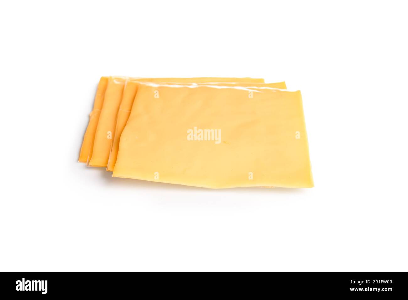 Slices of tasty processed cheese on white background Stock Photo - Alamy