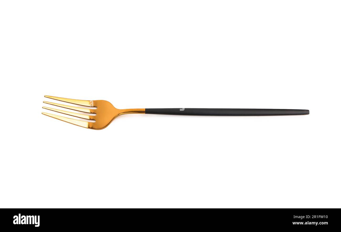 Golden fork with black handle on white background Stock Photo - Alamy
