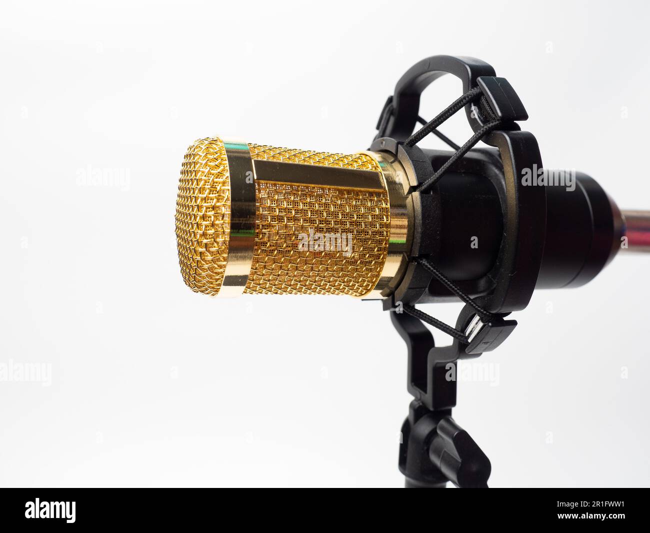 Picture of a black condenser microphone on a white isolated background ...