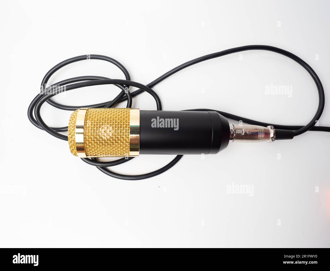 Picture of a black condenser microphone on a white isolated background ...