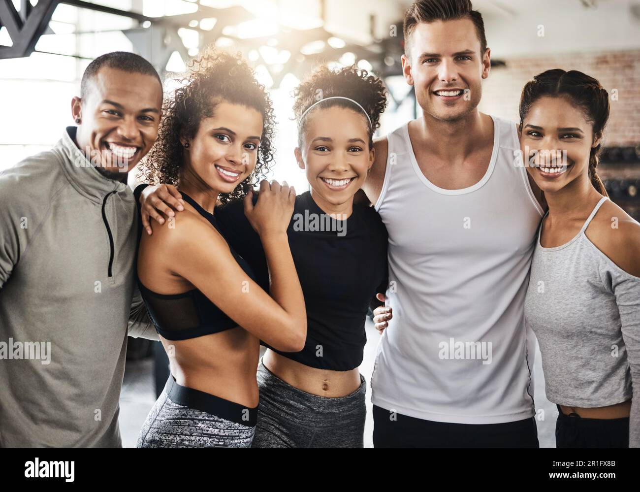 Friends, our best source of fitness motivation. a group of happy young ...