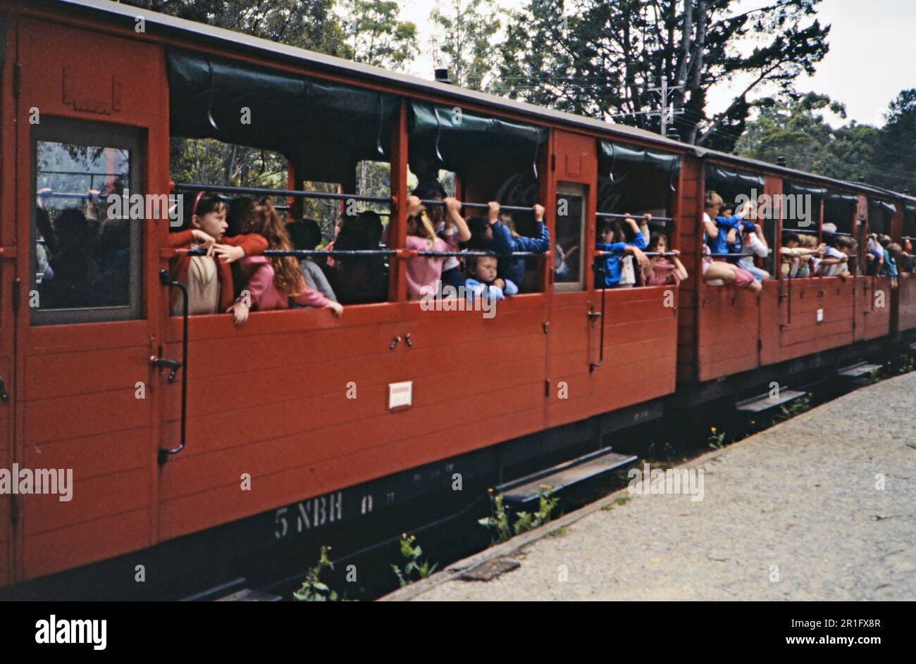 Kids having fun riding in a train ca. 1985 Stock Photo - Alamy