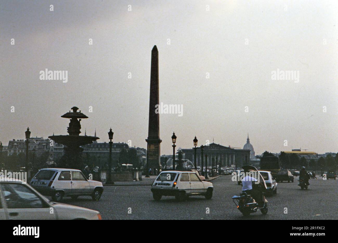 View of Place La Concorde and cars passing in front of the Luxor ...