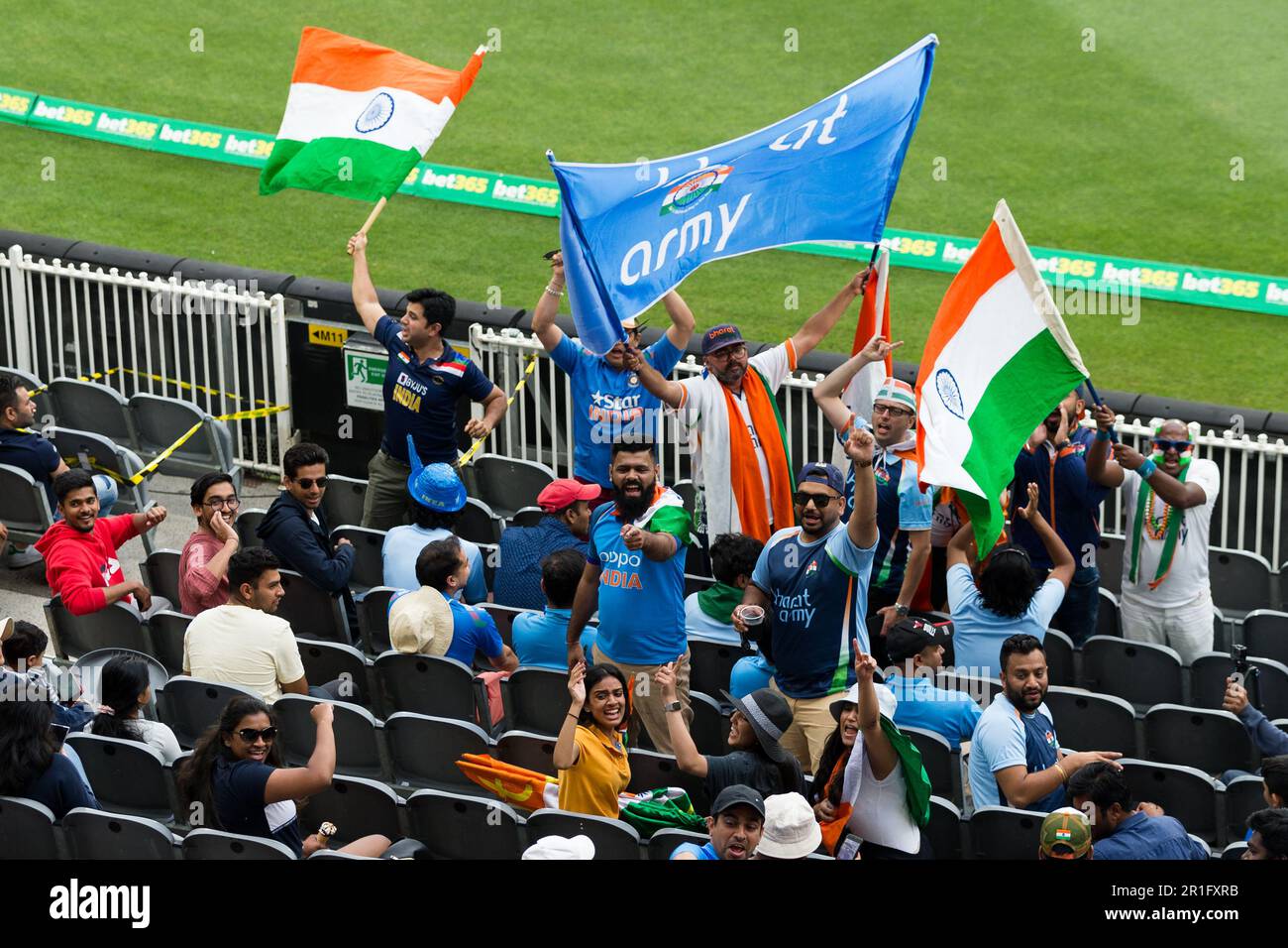 Team india cheering with flags hi-res stock photography and images - Alamy