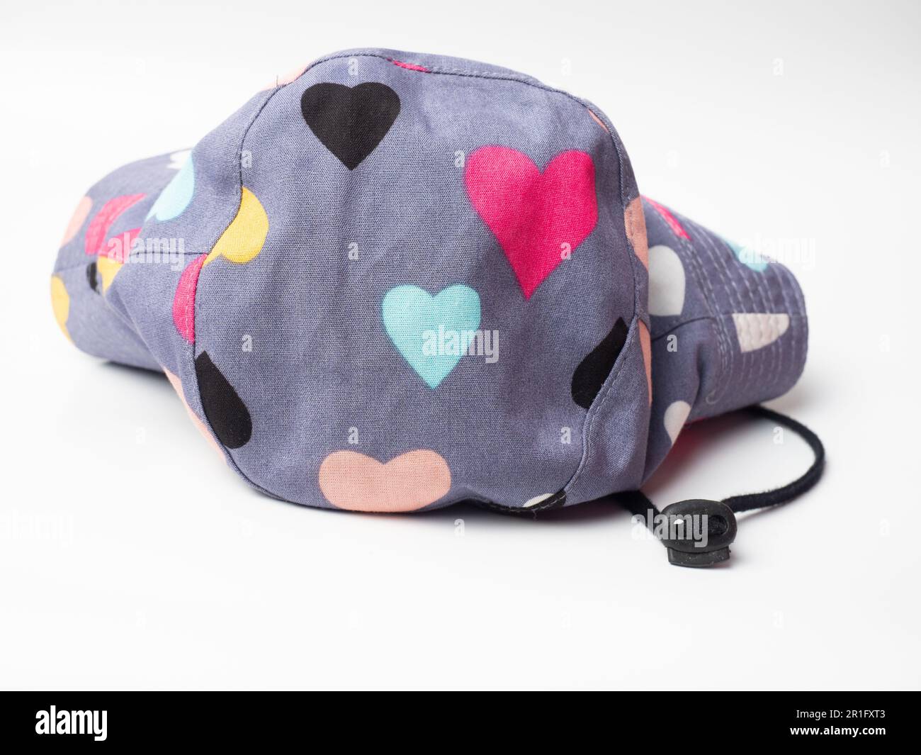 Picture of a bucket style hat with heart pattern Stock Photo - Alamy