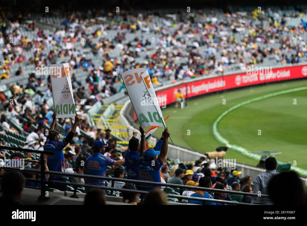 Team india cheering with flags hi-res stock photography and images - Alamy