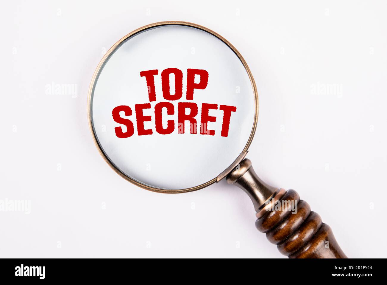 Top Secret. Magnifying glass and text on a white background Stock Photo ...