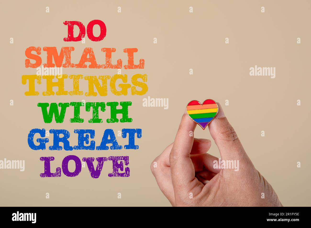 Do Small Things With Great Love. Rainbow colored heart and text on a ...